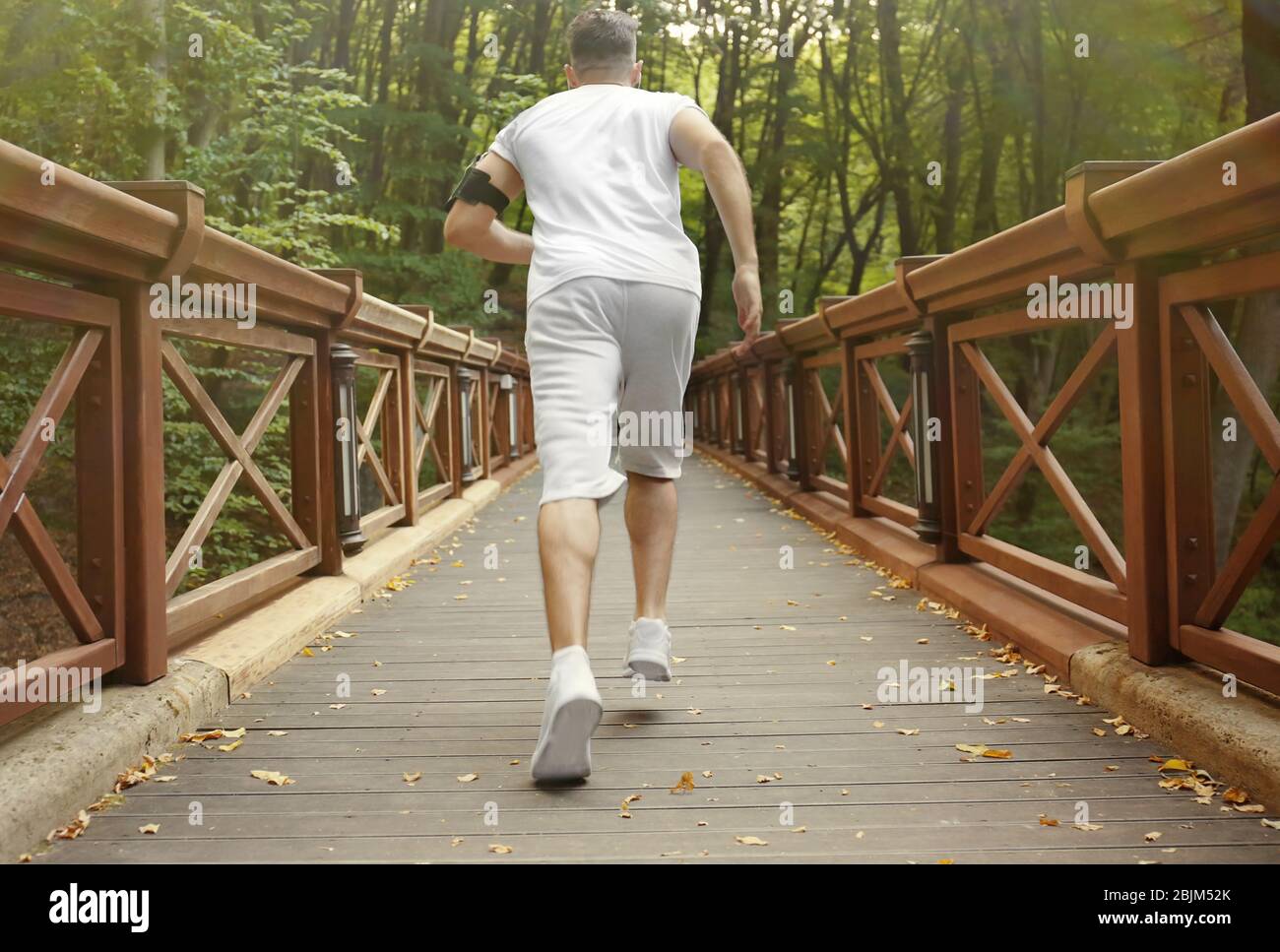 Man Running Over Bridge High Resolution Stock Photography and Images ...