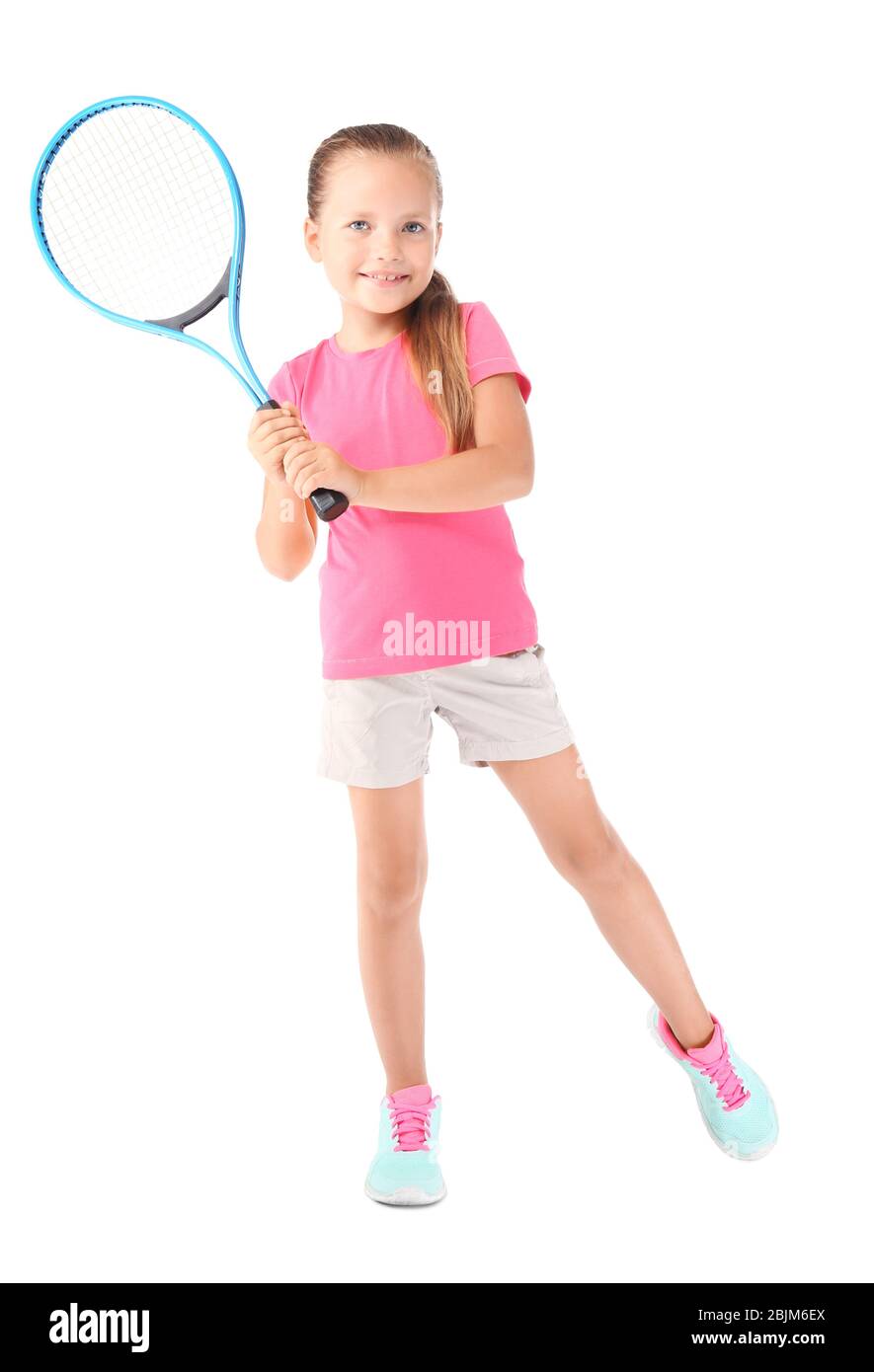 Cute little girl with tennis racket on white background Stock Photo - Alamy