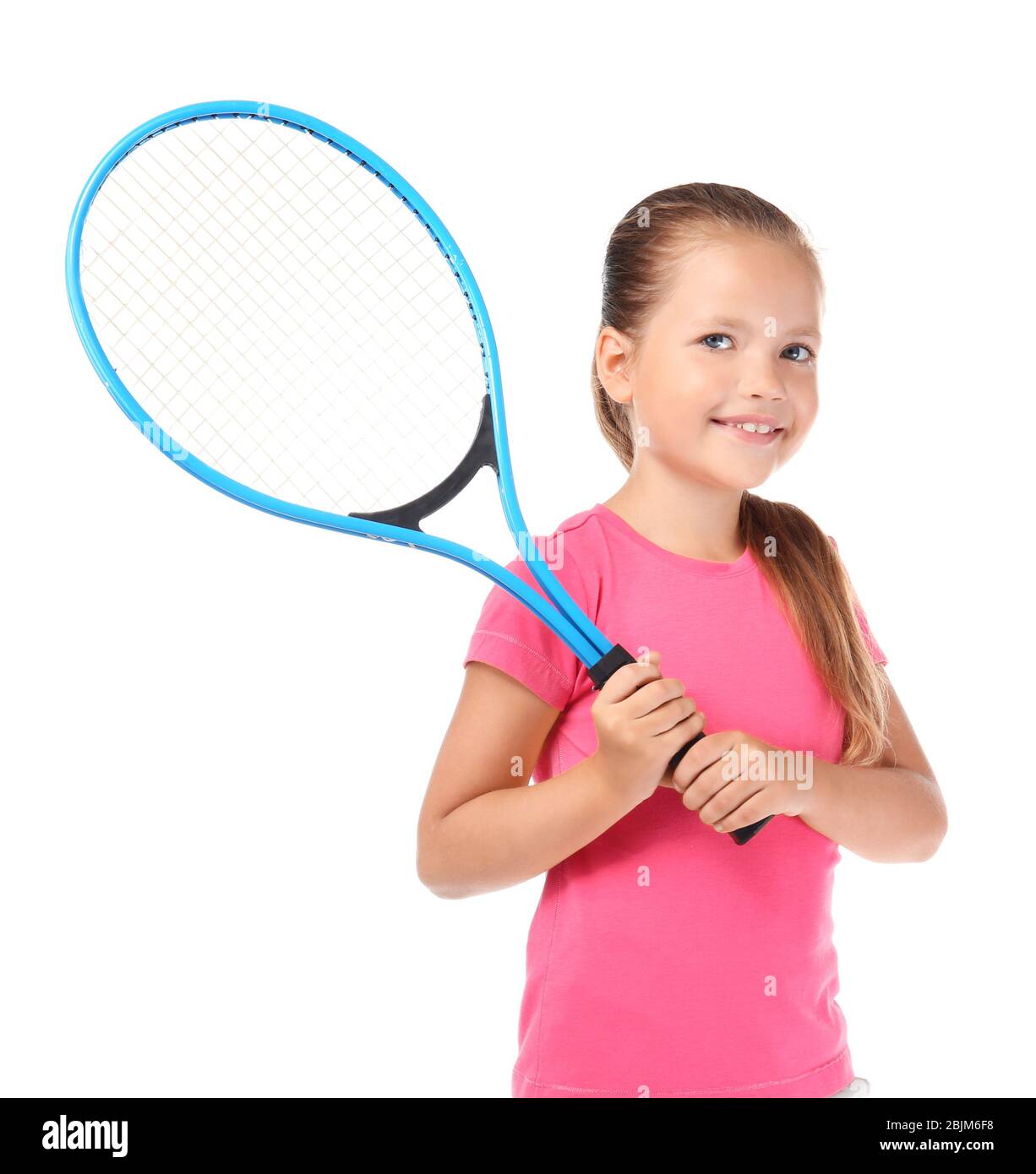 Cute little girl with tennis racket on white background Stock Photo - Alamy