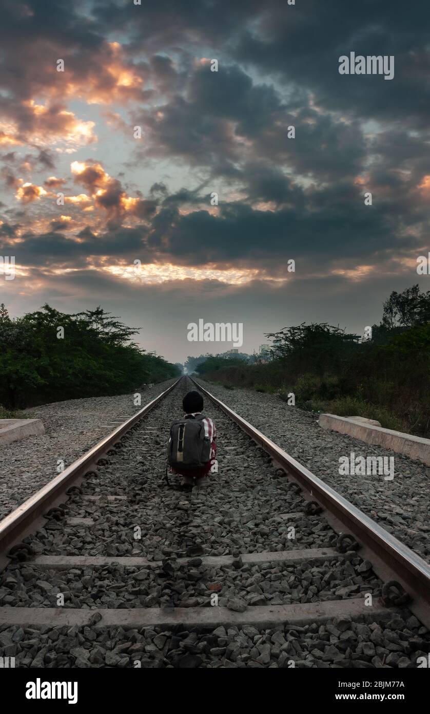 Boy on railway tracks hi-res stock photography and images - Alamy