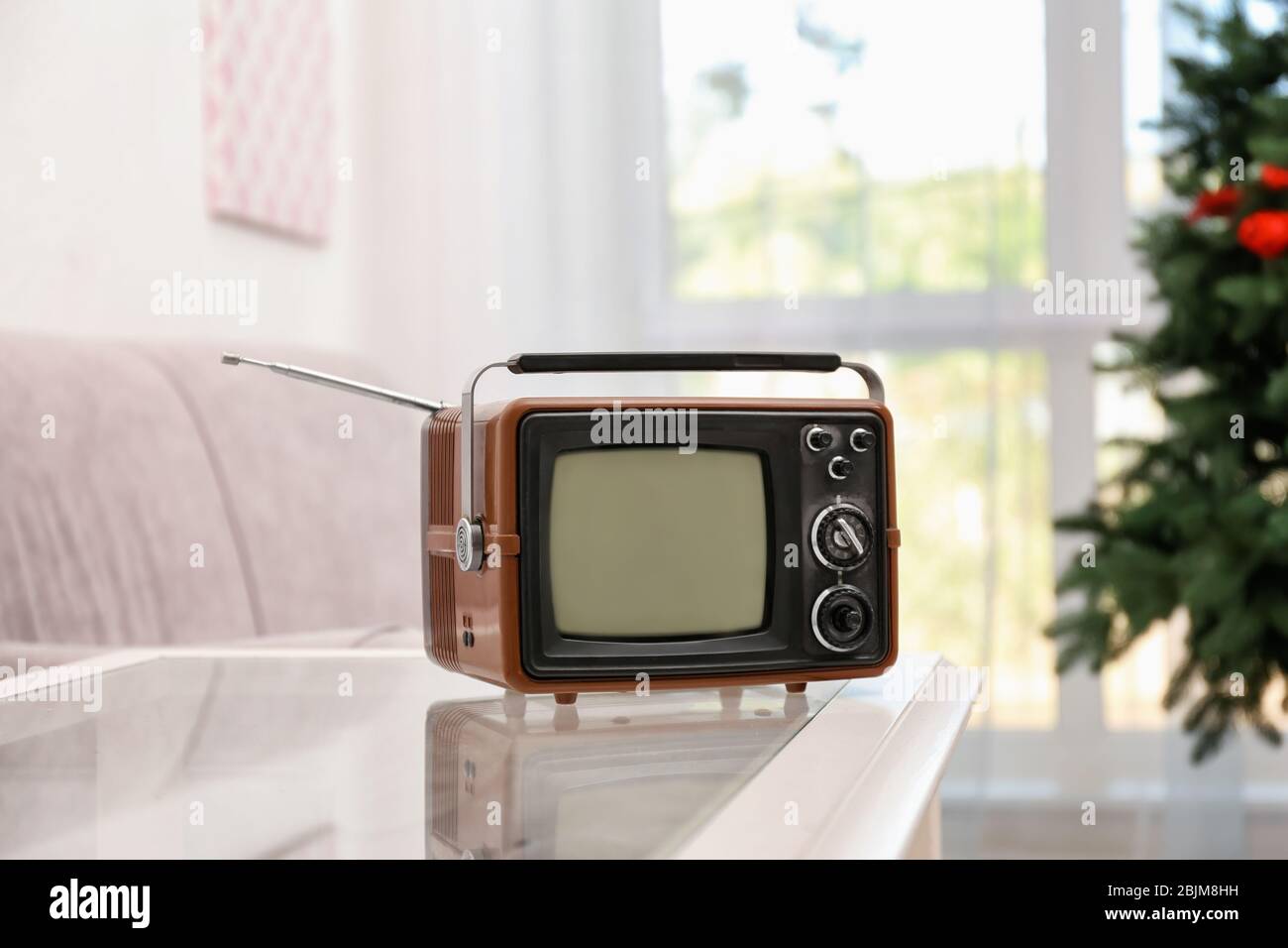 Old vintage TV on table in room Stock Photo - Alamy