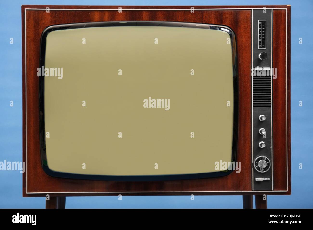 Old vintage TV on color background Stock Photo - Alamy
