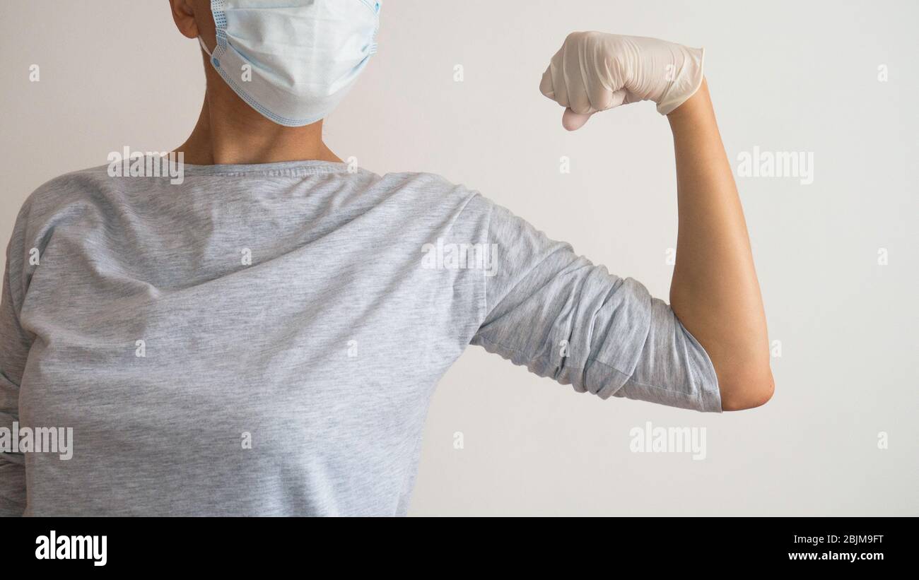 "We Can Do It!" Rosie the Riveter of today. Female doctor strongly ...