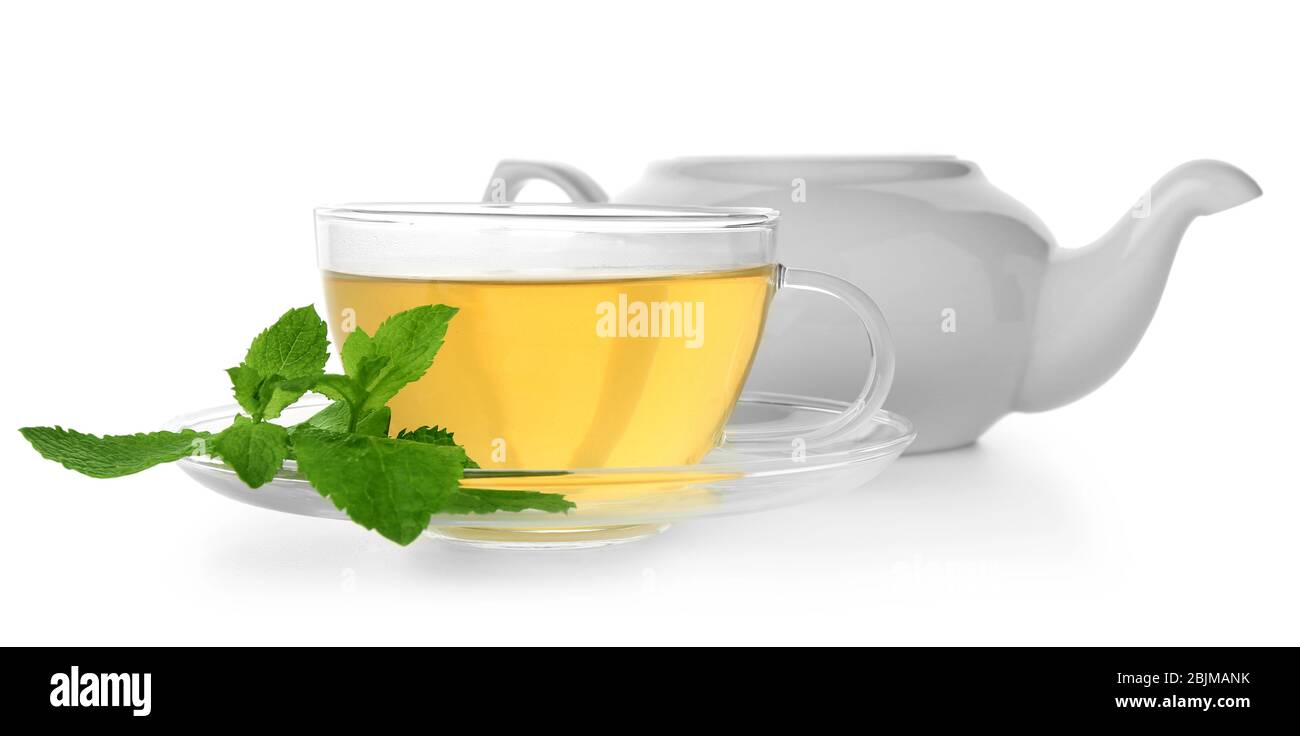Cup of mint tea on white background Stock Photo - Alamy