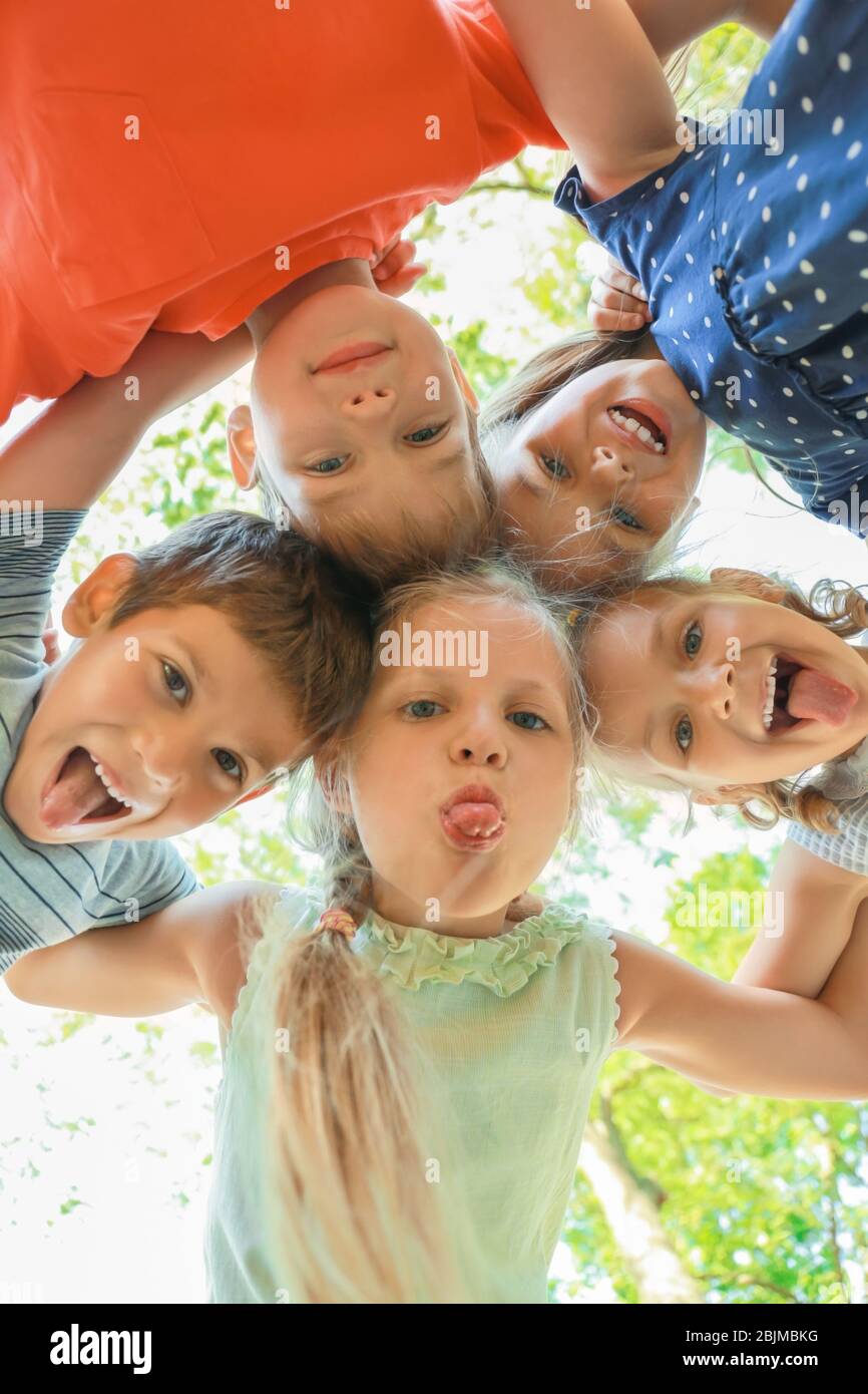 Group of children standing in circle, outdoors Stock Photo - Alamy
