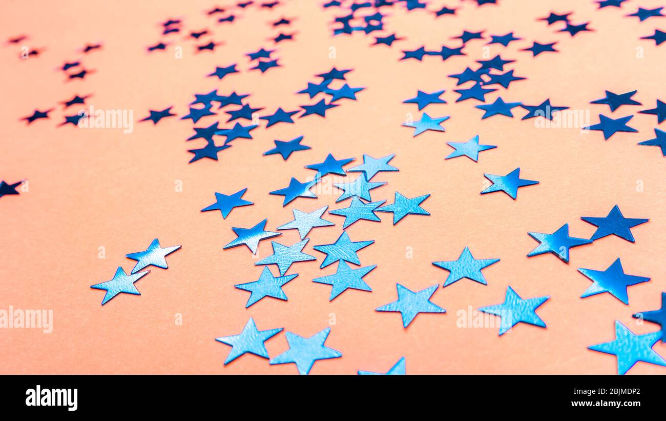 Orange background with blue spangles and stars. Banner for the site ...