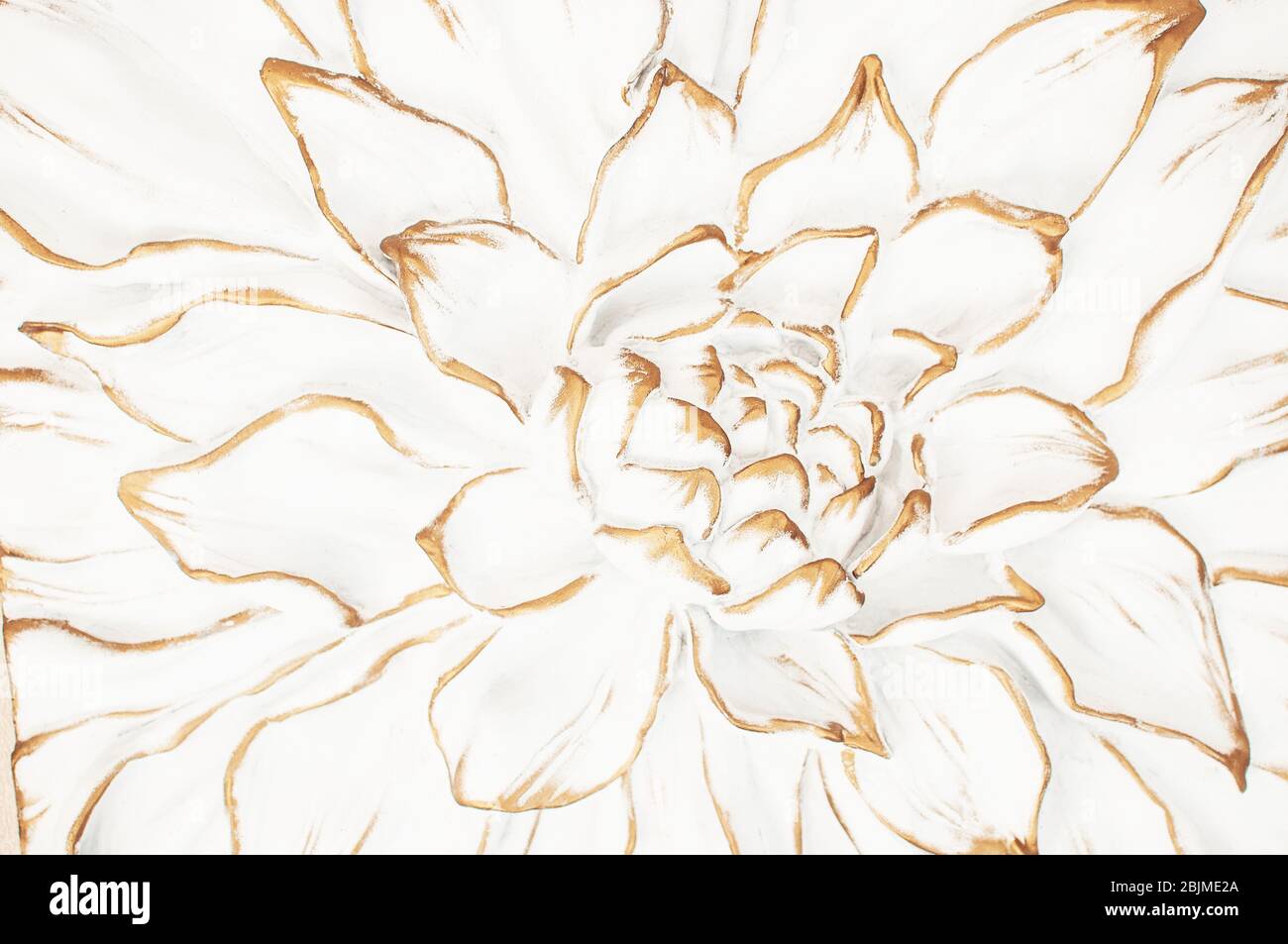 gypsum picture of a rose flower with golden petals handmade Stock Photo ...