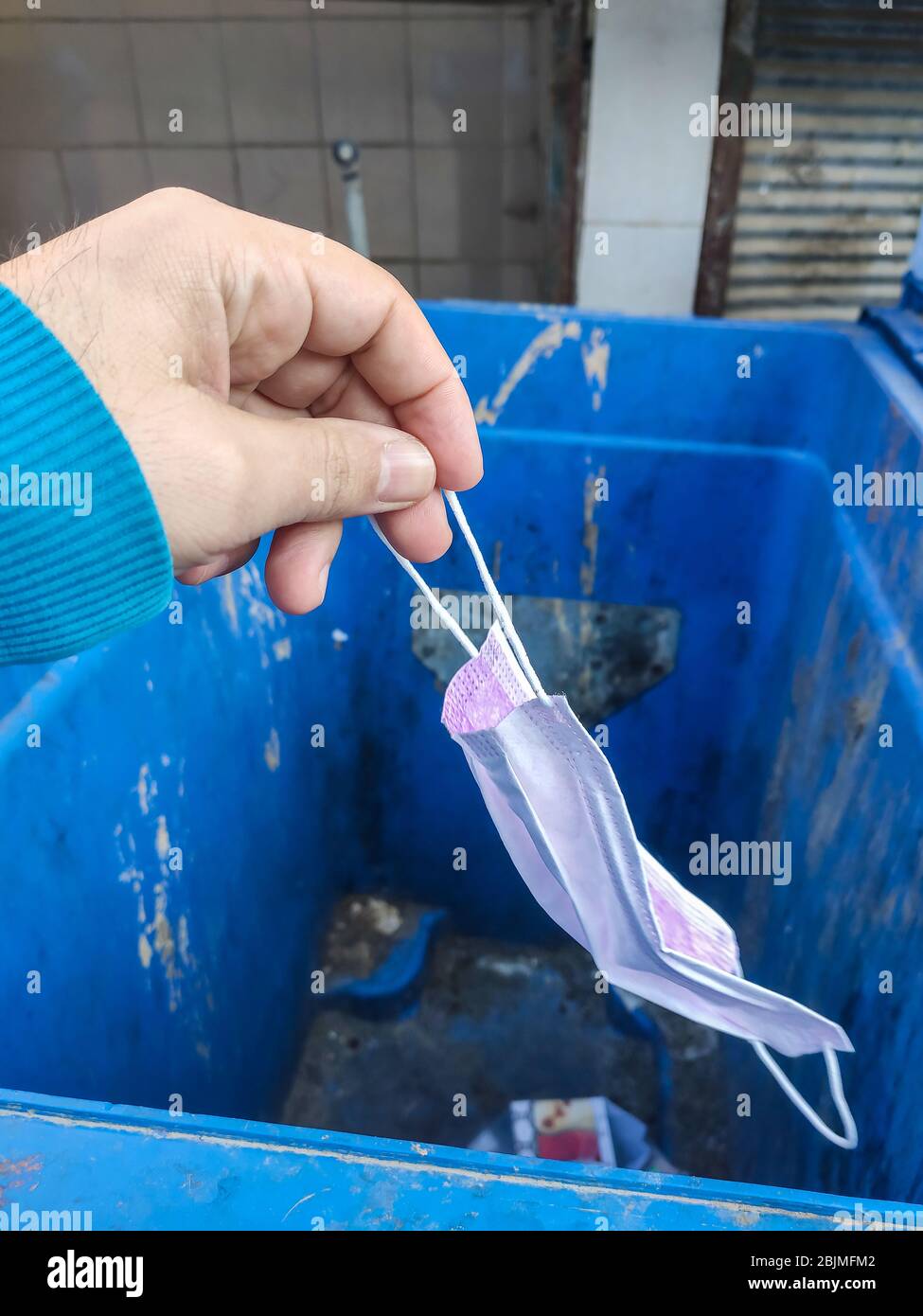 Throwing mask away hi-res stock photography and images - Alamy