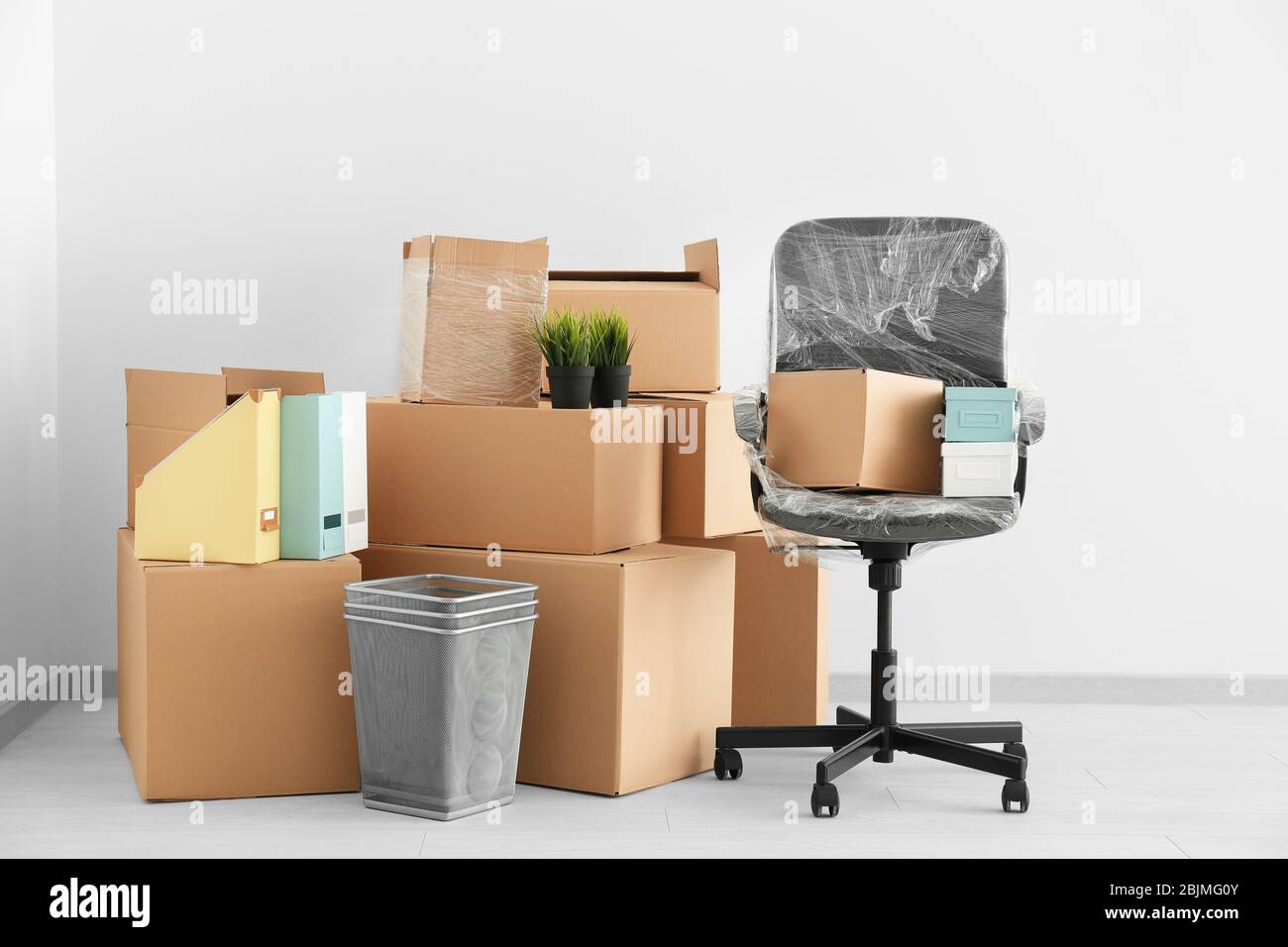 Office relocation chair and boxes hi-res stock photography and images ...