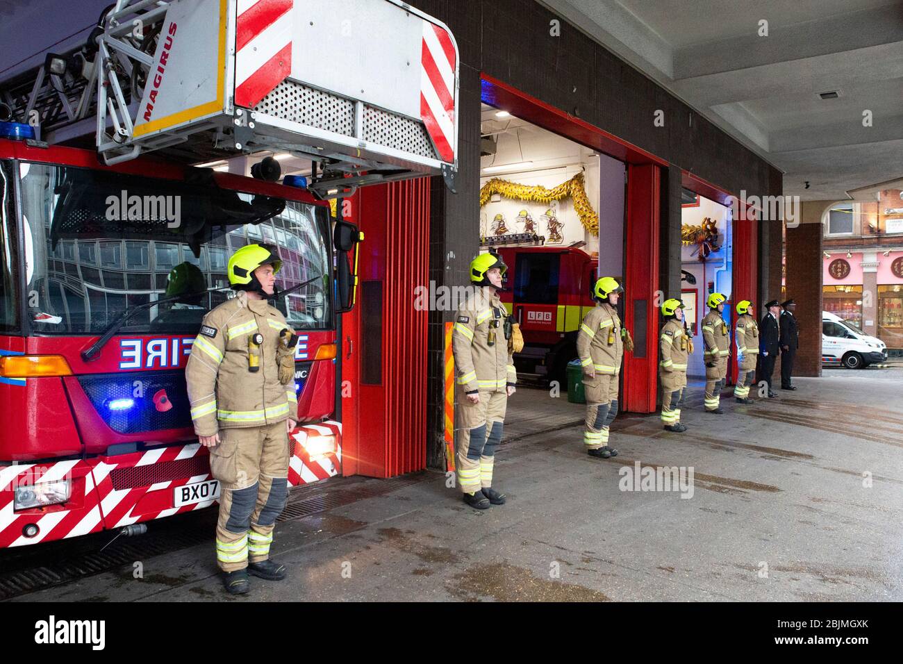 Firefighters at Soho Fire Station, Central London stand for a minute ...