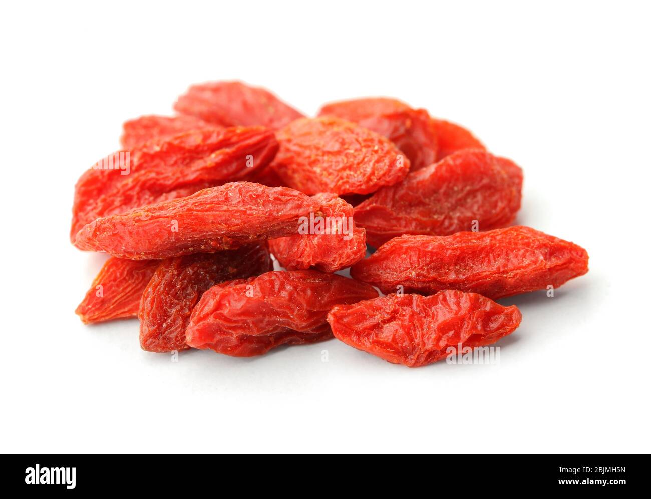 Red dried goji berries on white background Stock Photo - Alamy