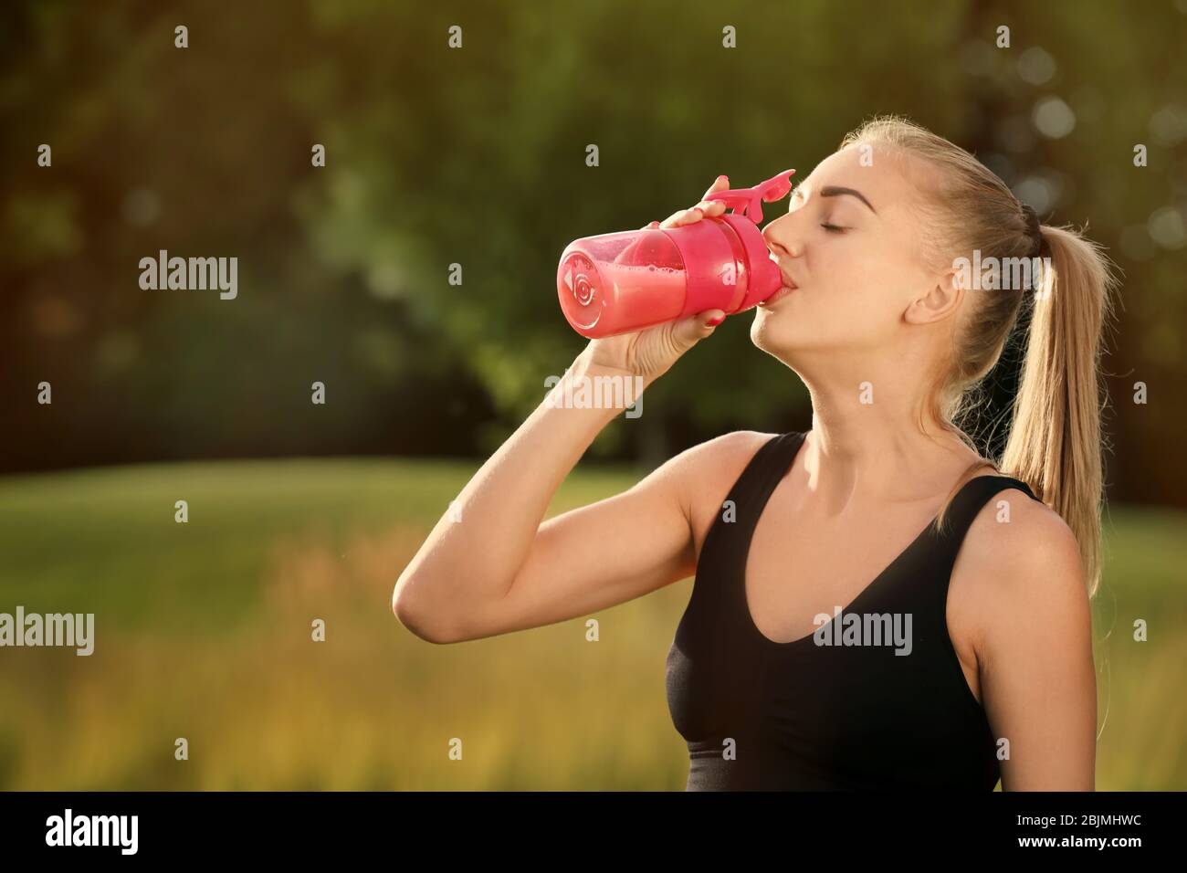 Young athletic woman protein hi-res stock photography and images - Alamy