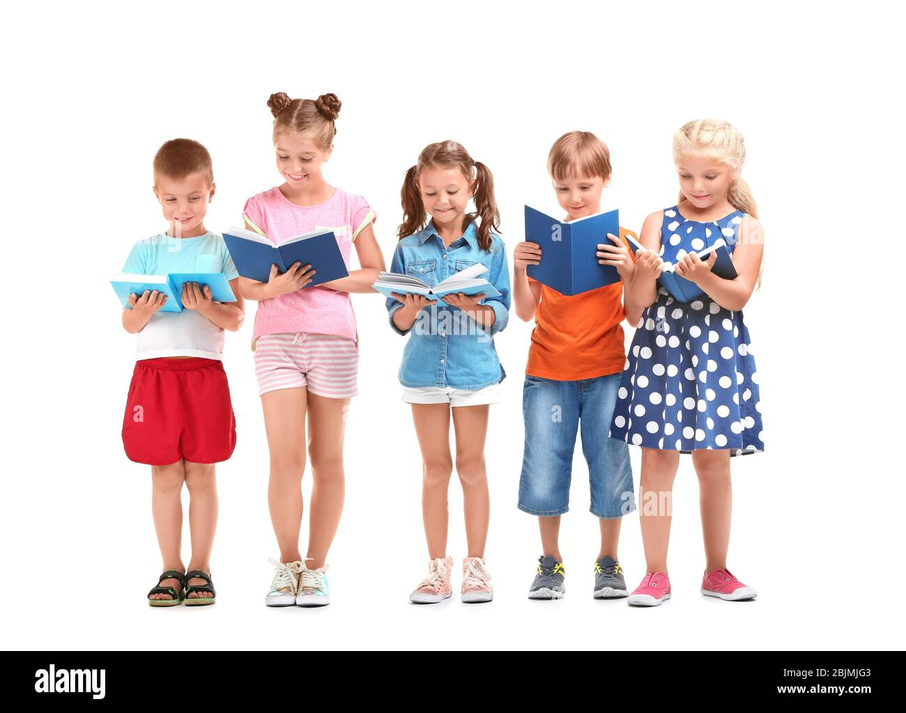Cute little children reading books on white background Stock Photo - Alamy