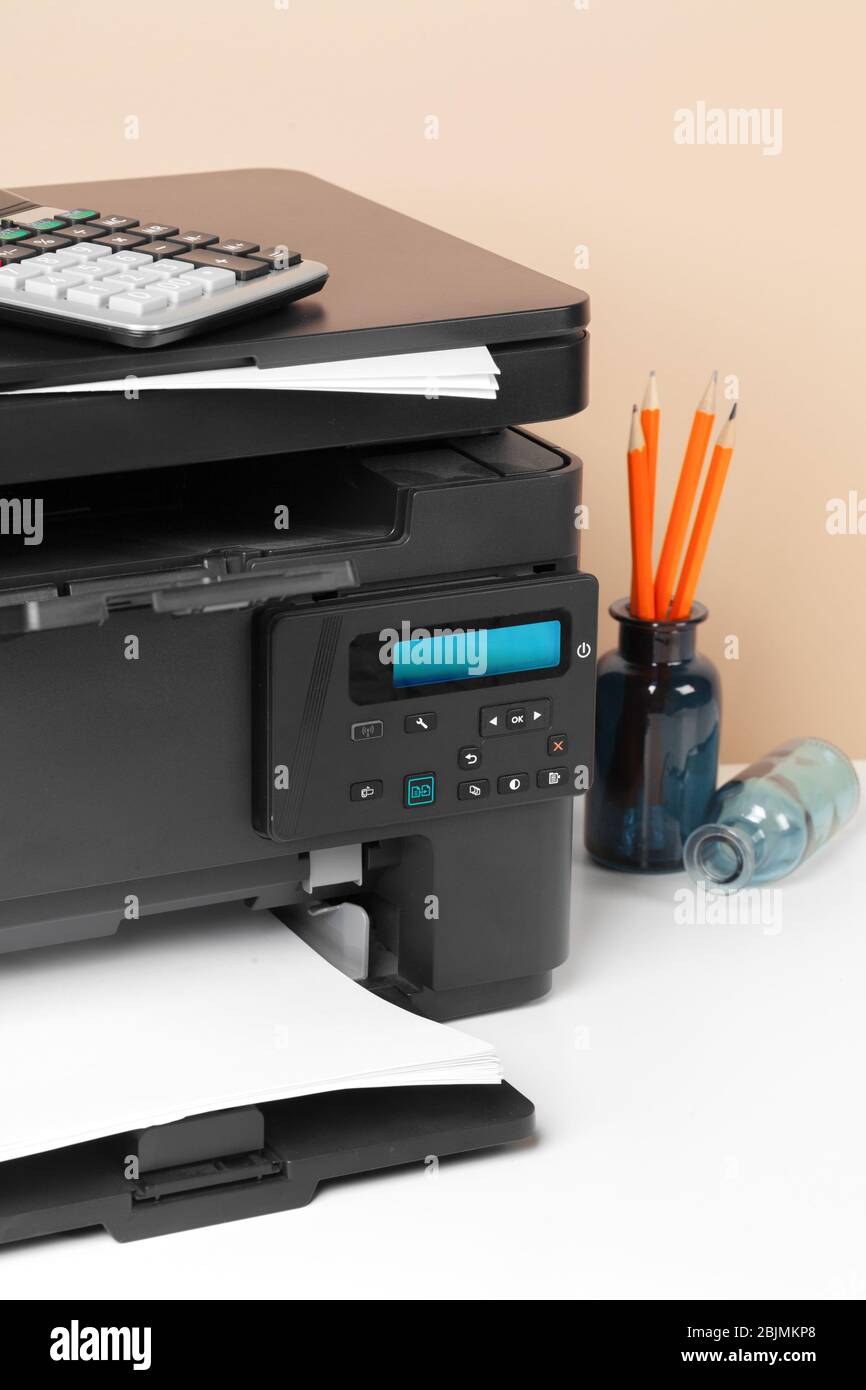 Printer, copier, scanner in office. Workplace. Close up Stock Photo - Alamy