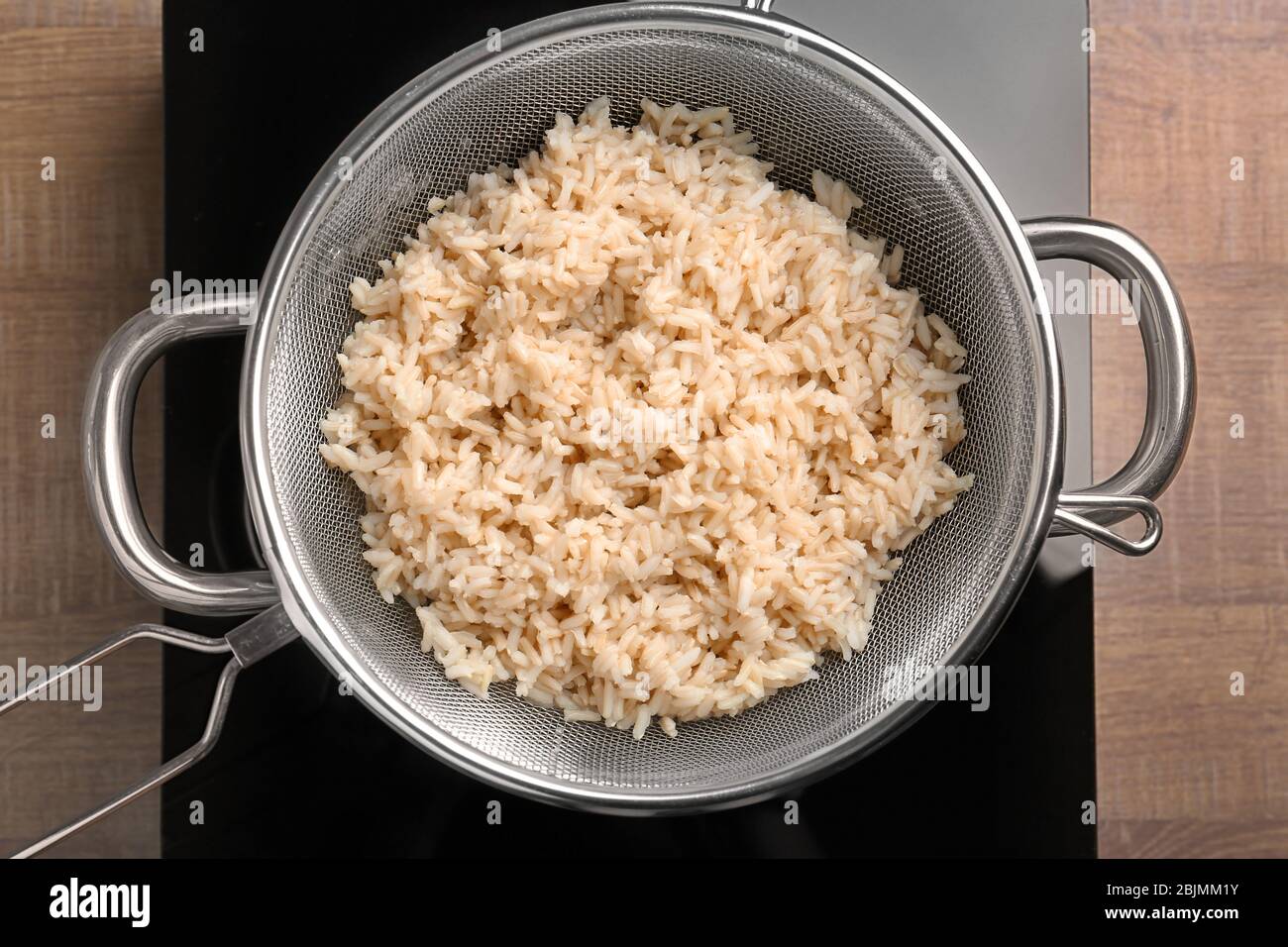 Sieve of rice hi-res stock photography and images - Alamy