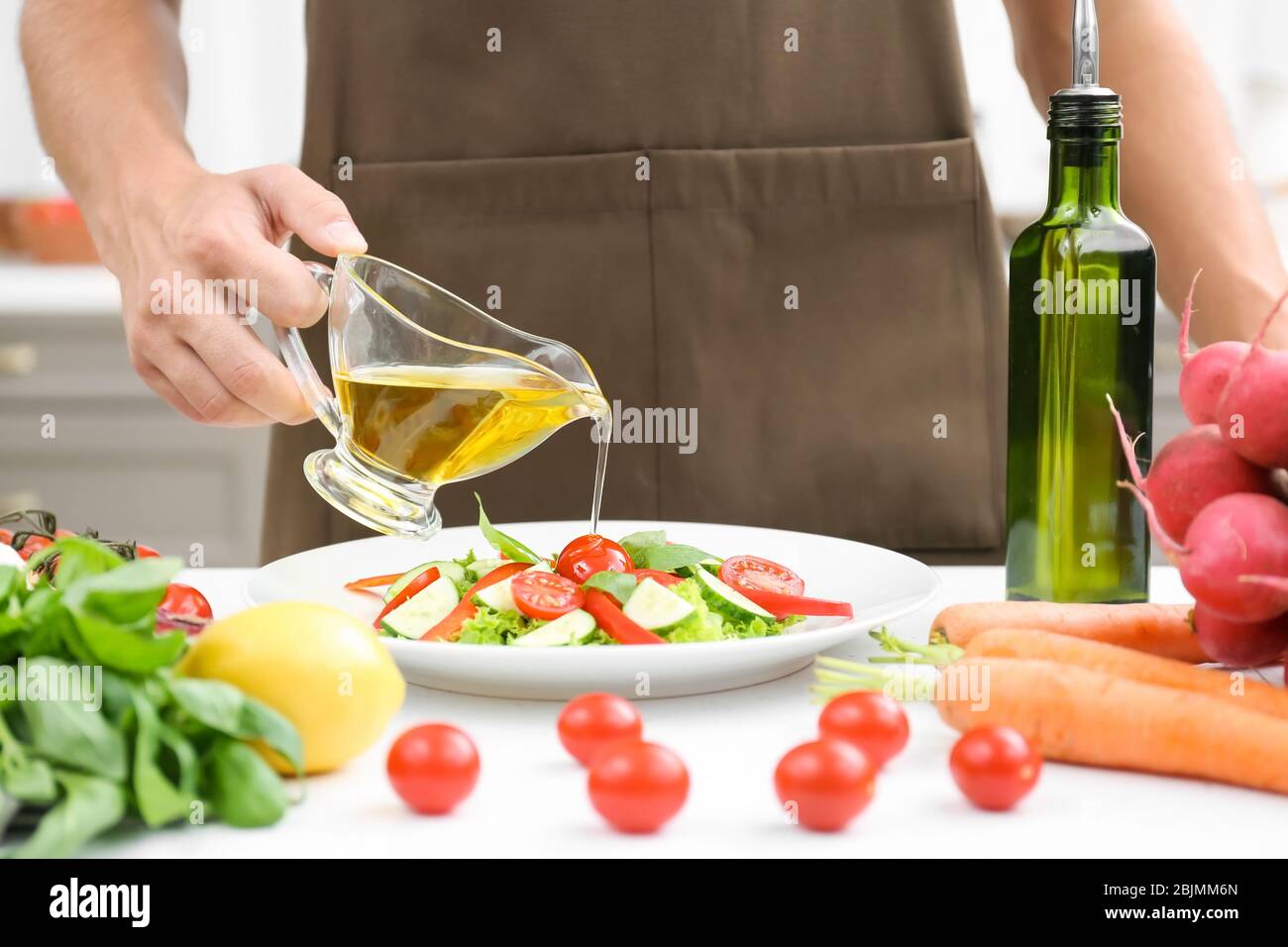 Pouring gravy oil hi-res stock photography and images - Alamy