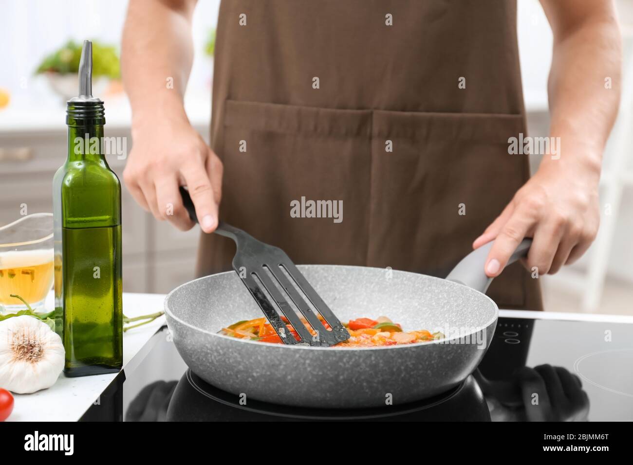 Vegetables oil man eating not woman hi-res stock photography and images ...
