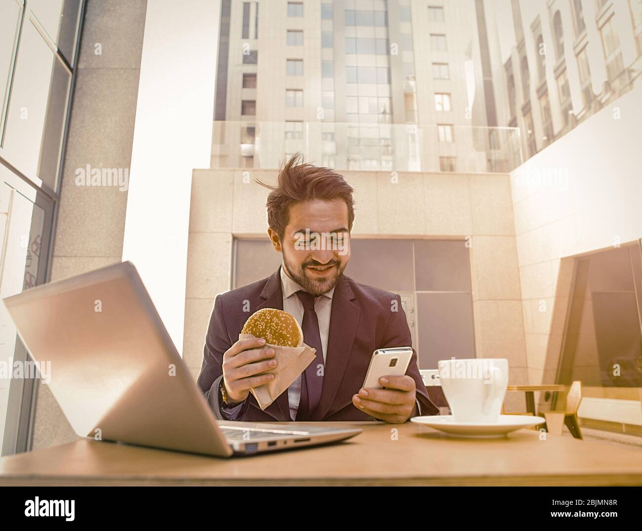 Man on break in cafe hi-res stock photography and images - Alamy