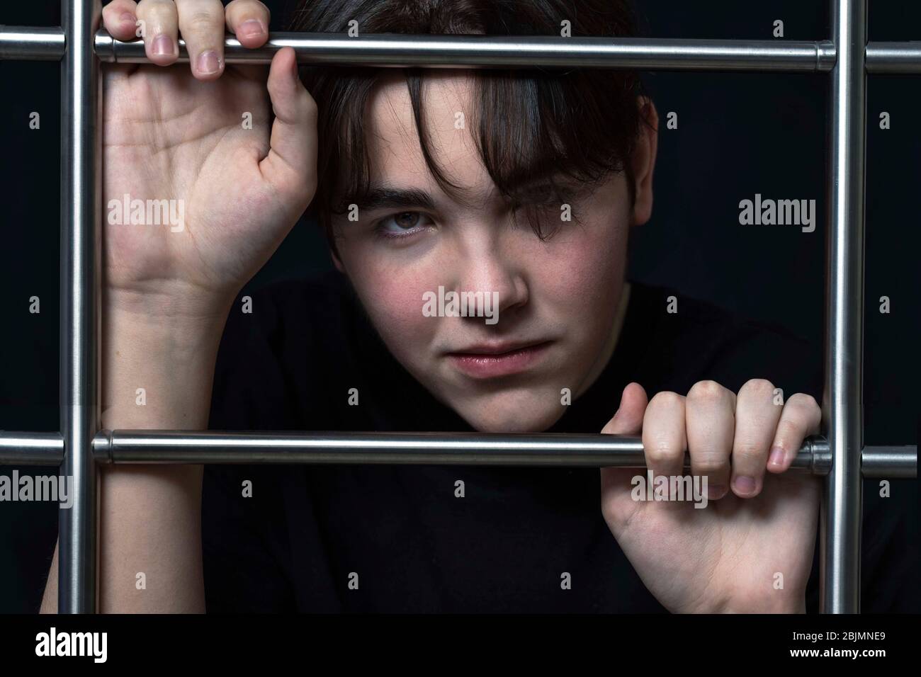 child in a cage, the concept of restriction of freedom and violation of ...