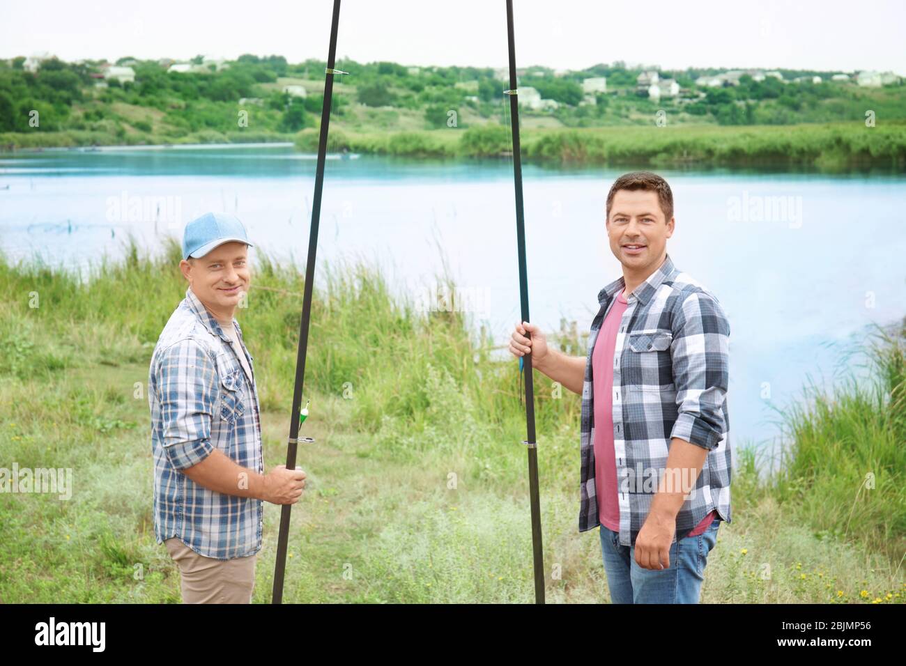 Two men going fishing hi-res stock photography and images - Alamy