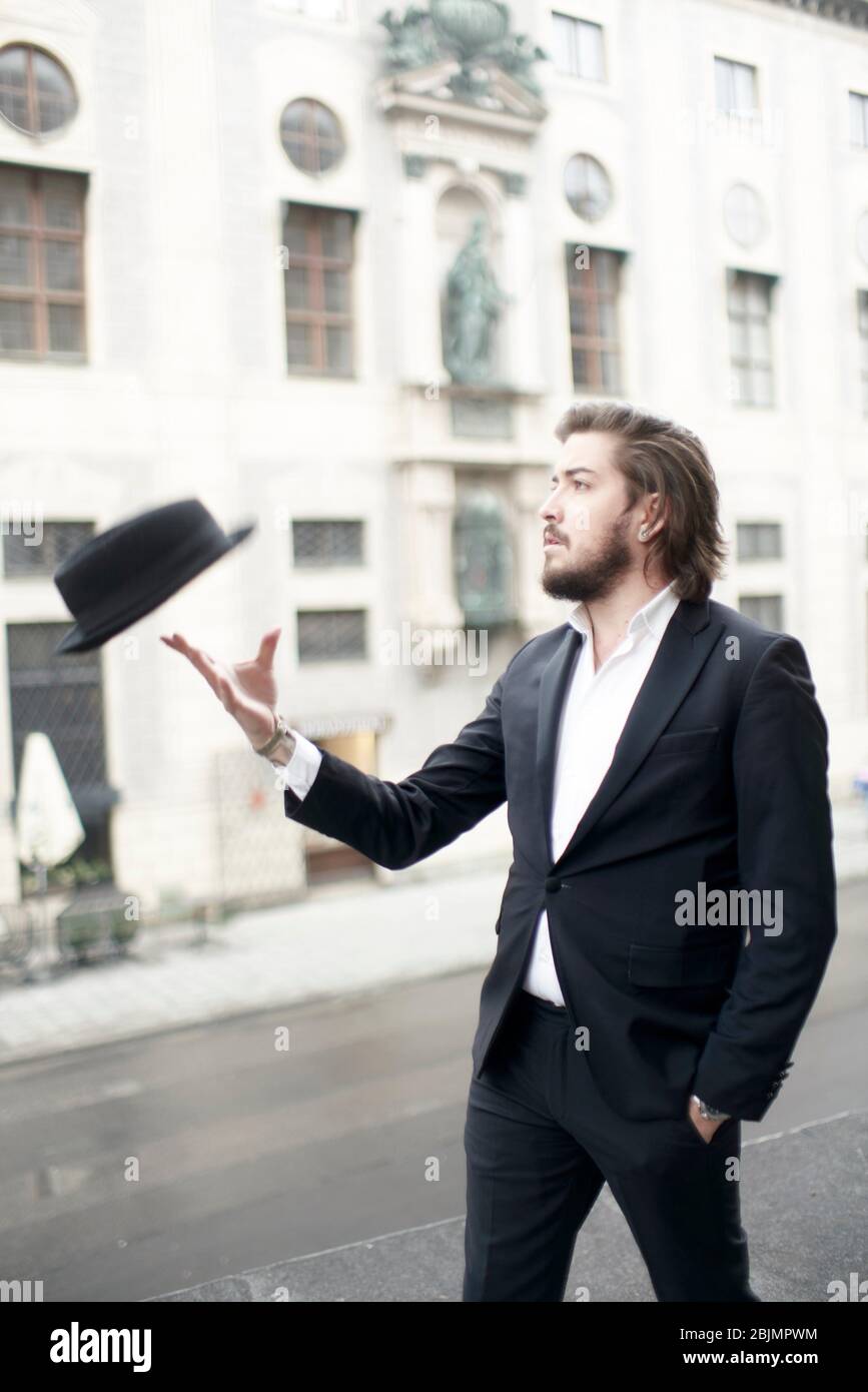 Middle eastern man with beard and hat hi-res stock photography and ...