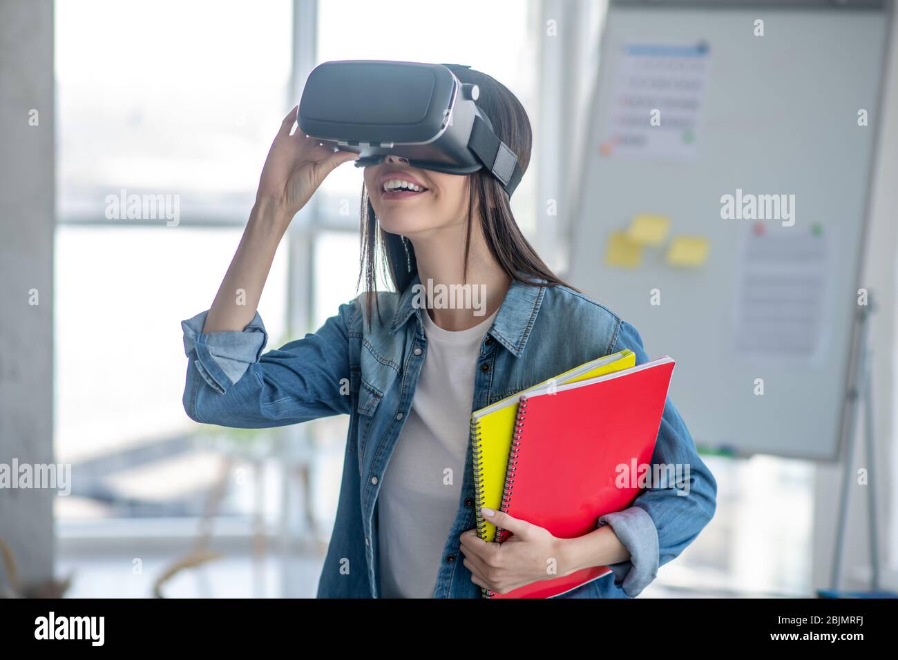 Excited millennial wearing virtual reality hi-res stock photography and ...