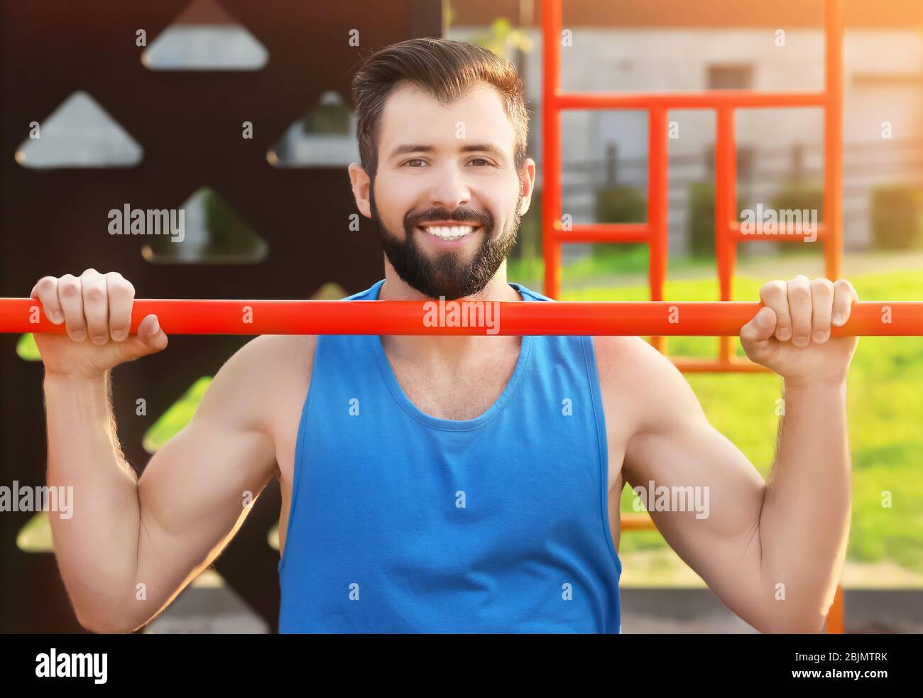 Man chin up playground hi-res stock photography and images - Alamy