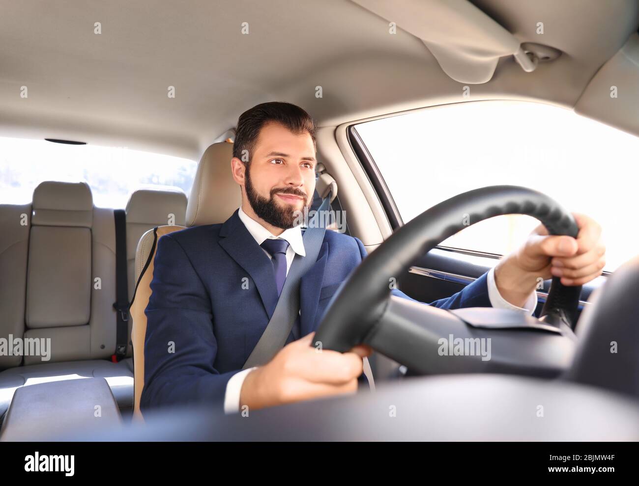 Handsome businessman on drivers hi-res stock photography and images - Alamy