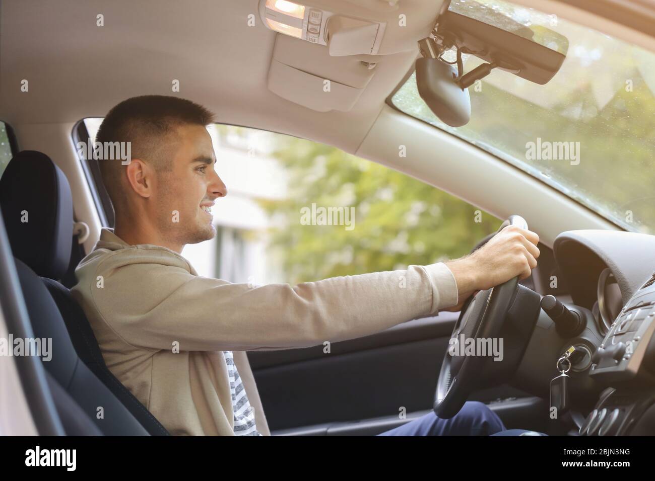 Man driving modern car hi-res stock photography and images - Alamy