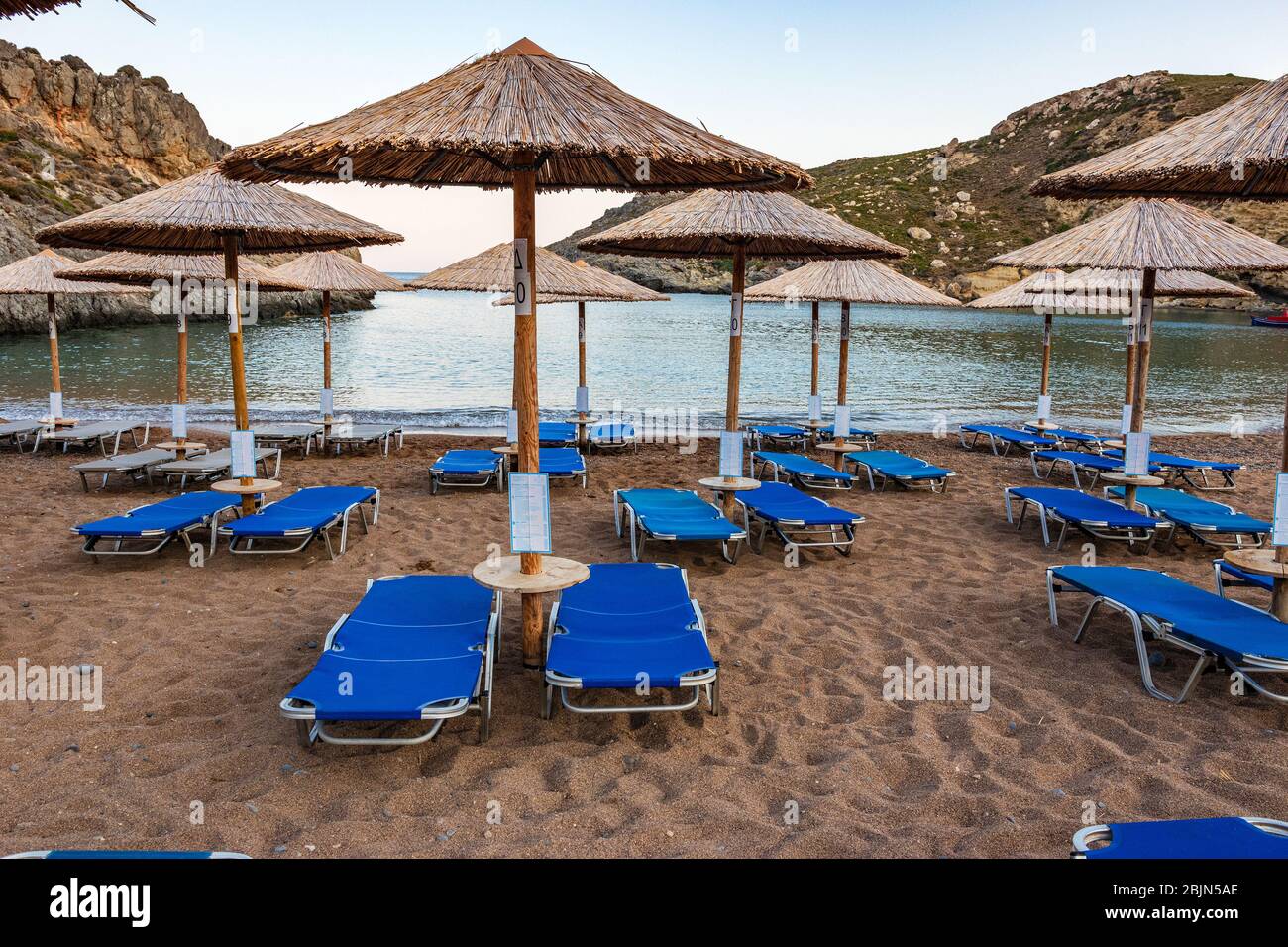 The famous rocky beach Melidoni at sunset. Amazing scenery with crystal ...