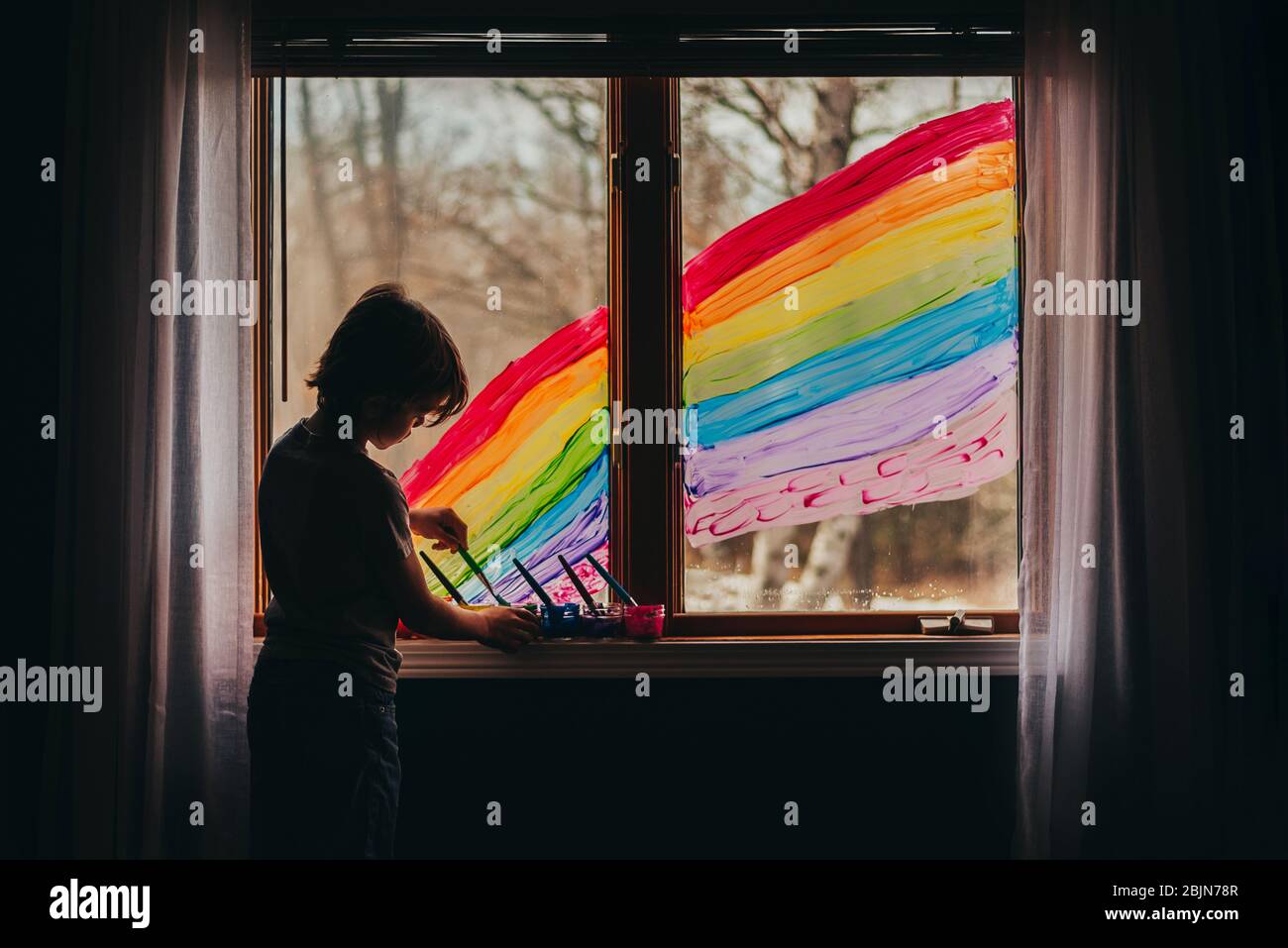 Child rainbow window hi-res stock photography and images - Alamy