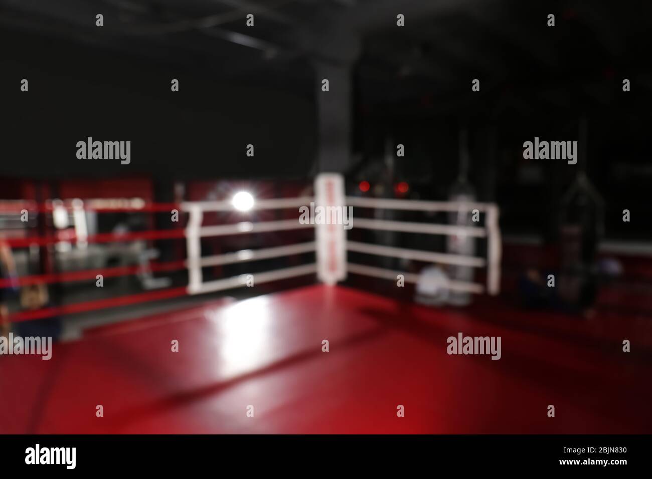 Blurred view of boxing ring in gym Stock Photo - Alamy