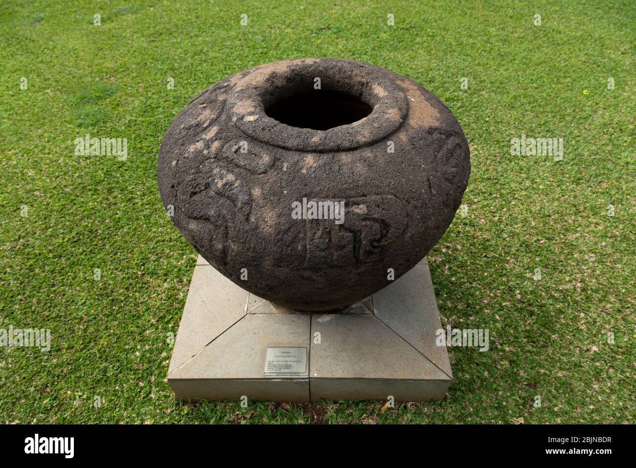 Jakarta, Indonesia - July 14, 2019: Ancient tempayan or stone vase with ...
