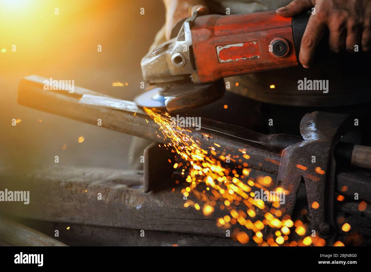 Using a hand grinder hi-res stock photography and images - Alamy
