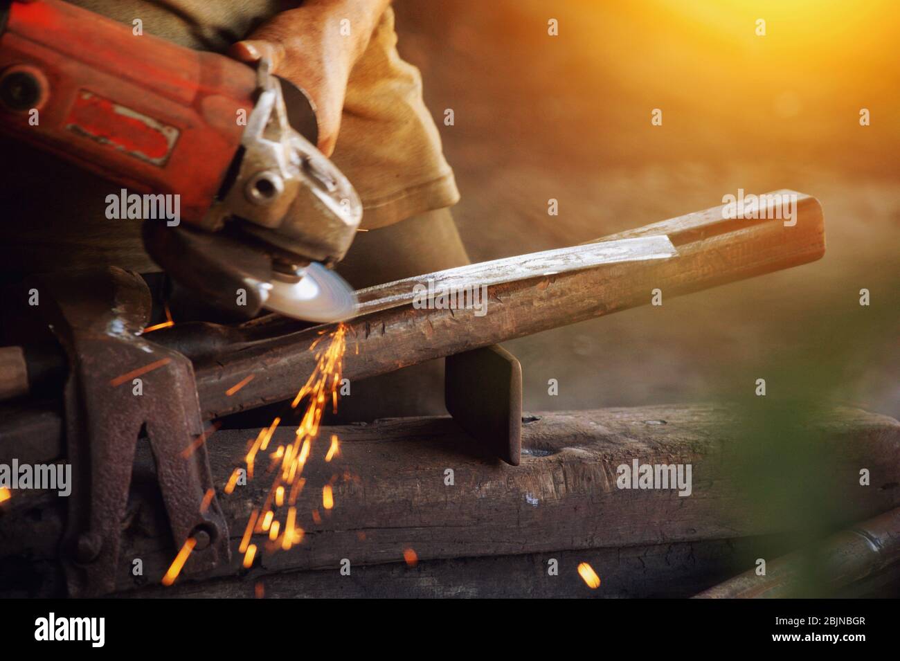 Using a hand grinder hi-res stock photography and images - Alamy