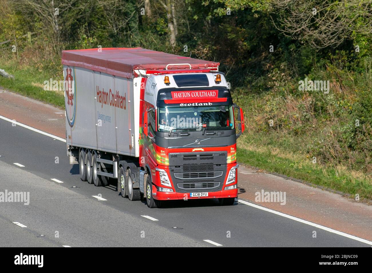 Hayton Coultard Scotland; red Haulage delivery trucks, lorry ...