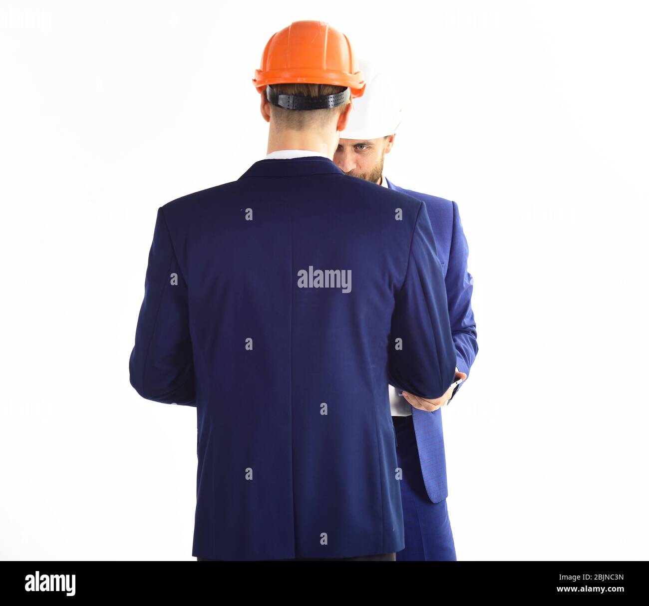 Engineers at meeting, back view. Construction, engineering, business ...