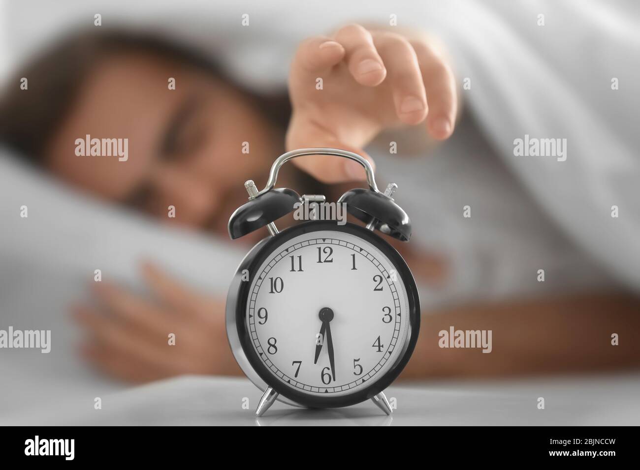 Switching off alarm clock hi-res stock photography and images - Alamy