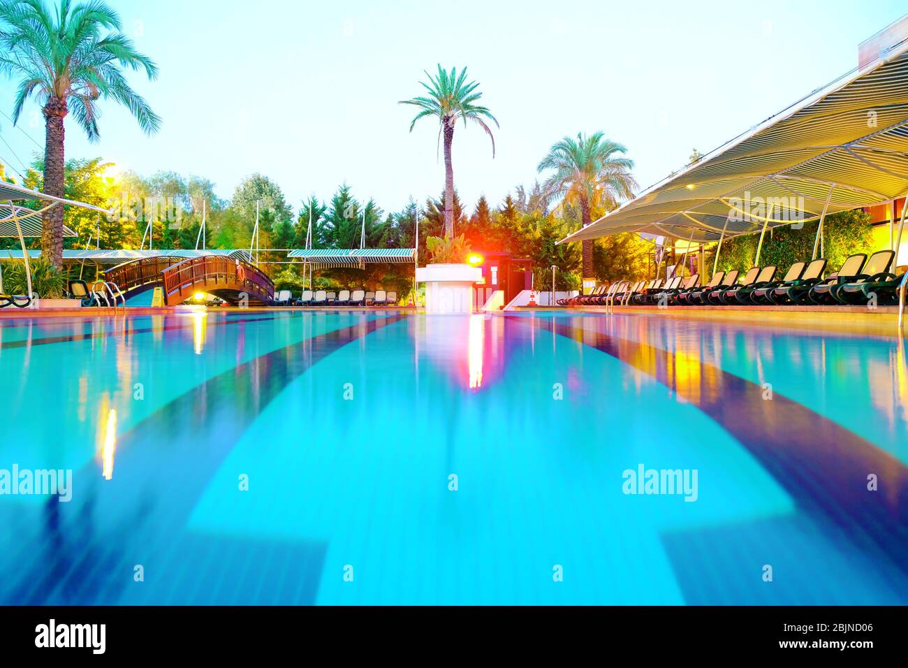 View of swimming pool at resort Stock Photo - Alamy