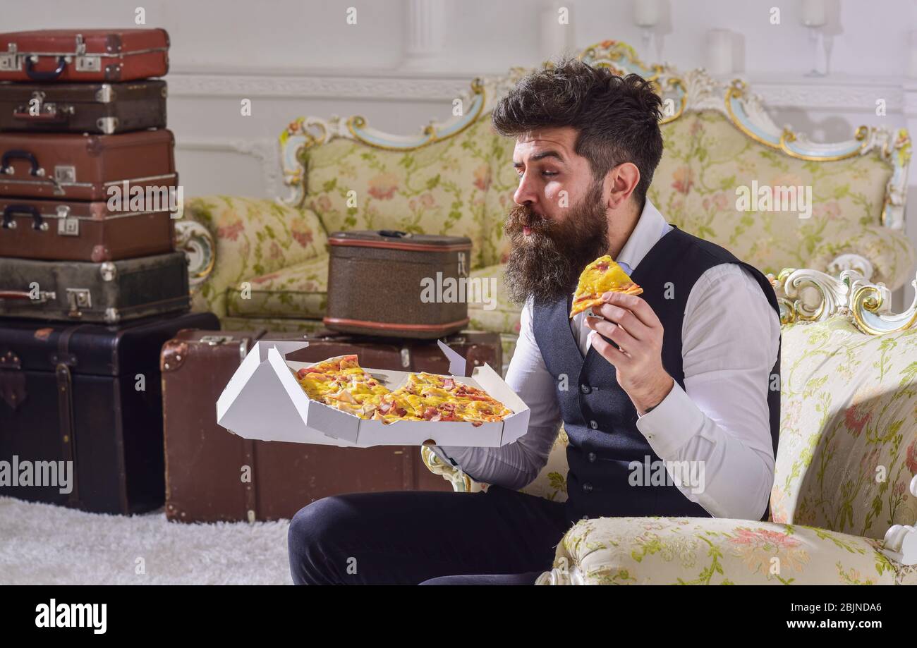 Man with beard and mustache holds delivered box with tasty fresh hot ...