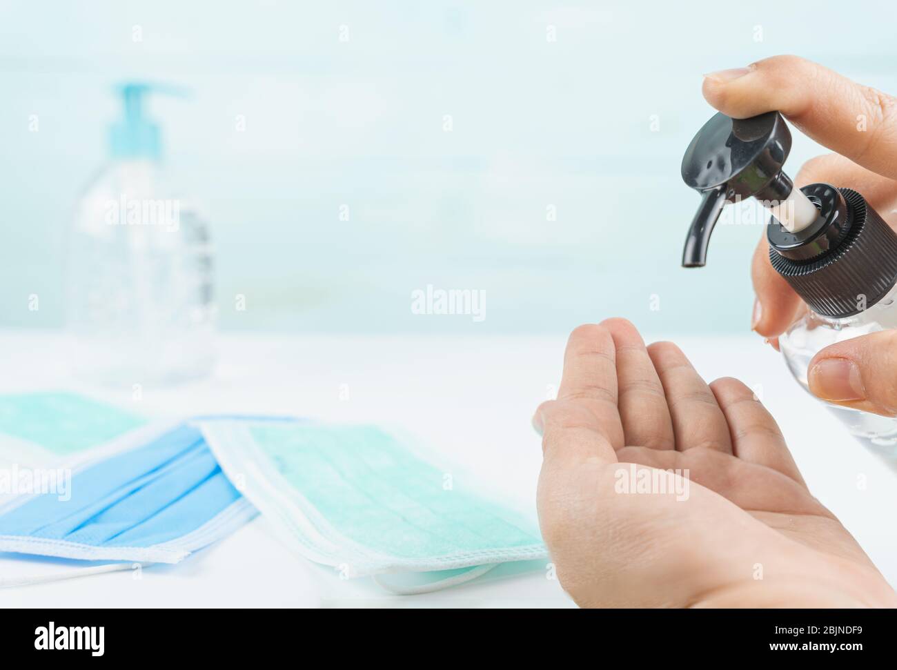 Male hand using alcohol gel clean hand hygiene for prevention ...