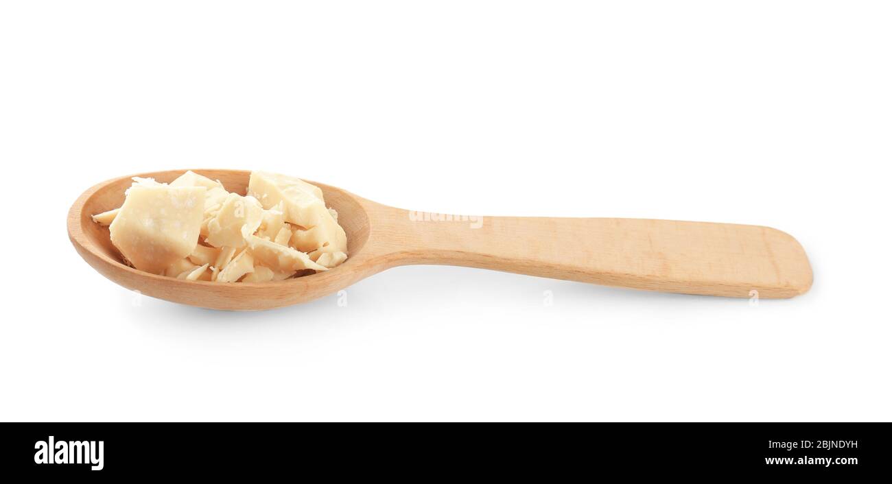 Wooden spoon with cocoa butter on white background Stock Photo - Alamy