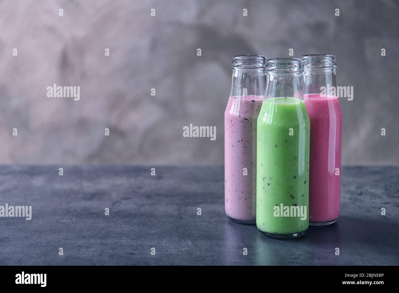 Three bottles different color hi-res stock photography and images - Alamy