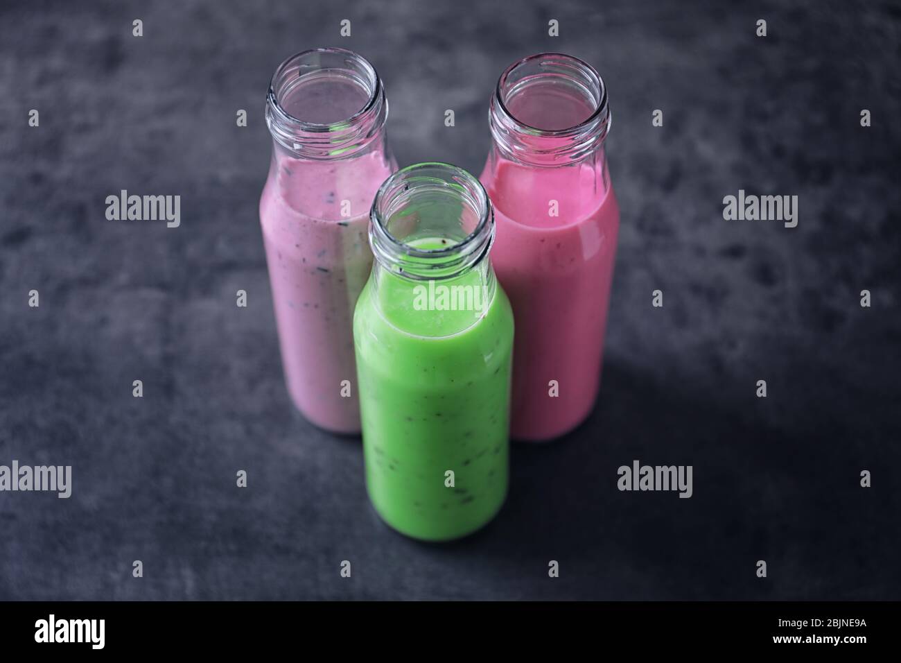 Three bottles different color hi-res stock photography and images - Alamy