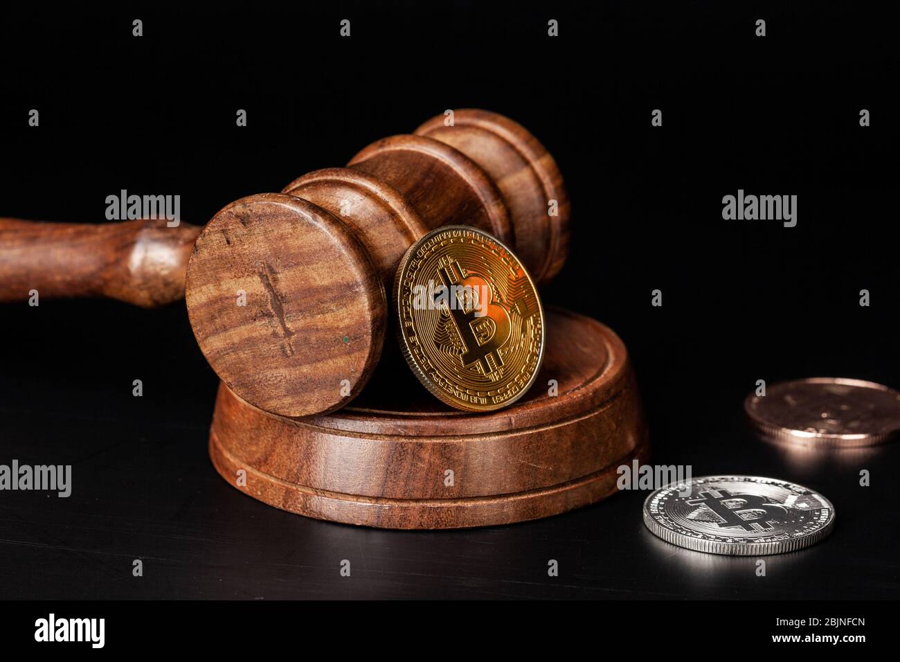 Law mallet and a stack of money Stock Photo - Alamy