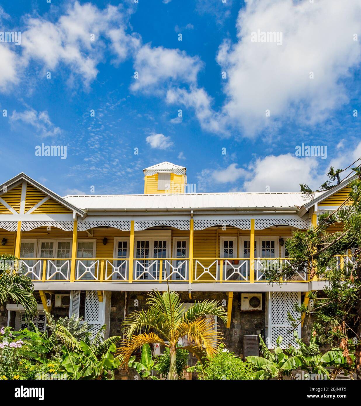 Yellow and White Building in St Kitts Stock Photo - Alamy