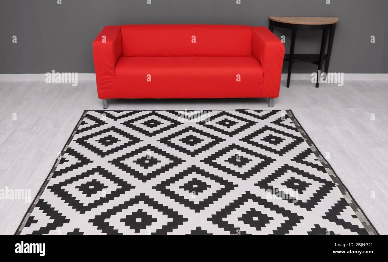 Black and white carpet on floor in living room Stock Photo - Alamy