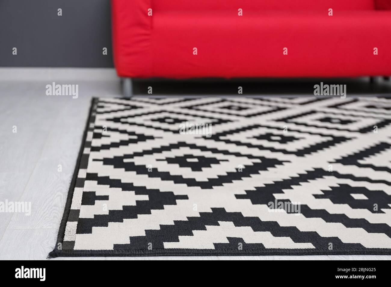 Black and white carpet on floor in living room, closeup Stock Photo - Alamy
