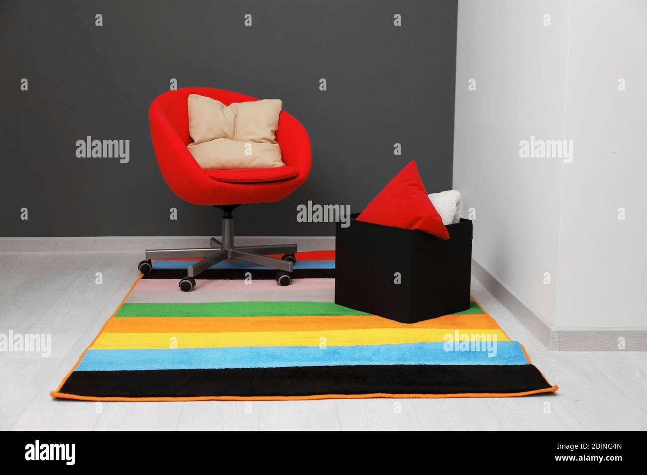 Beautiful colorful carpet on floor indoors Stock Photo - Alamy