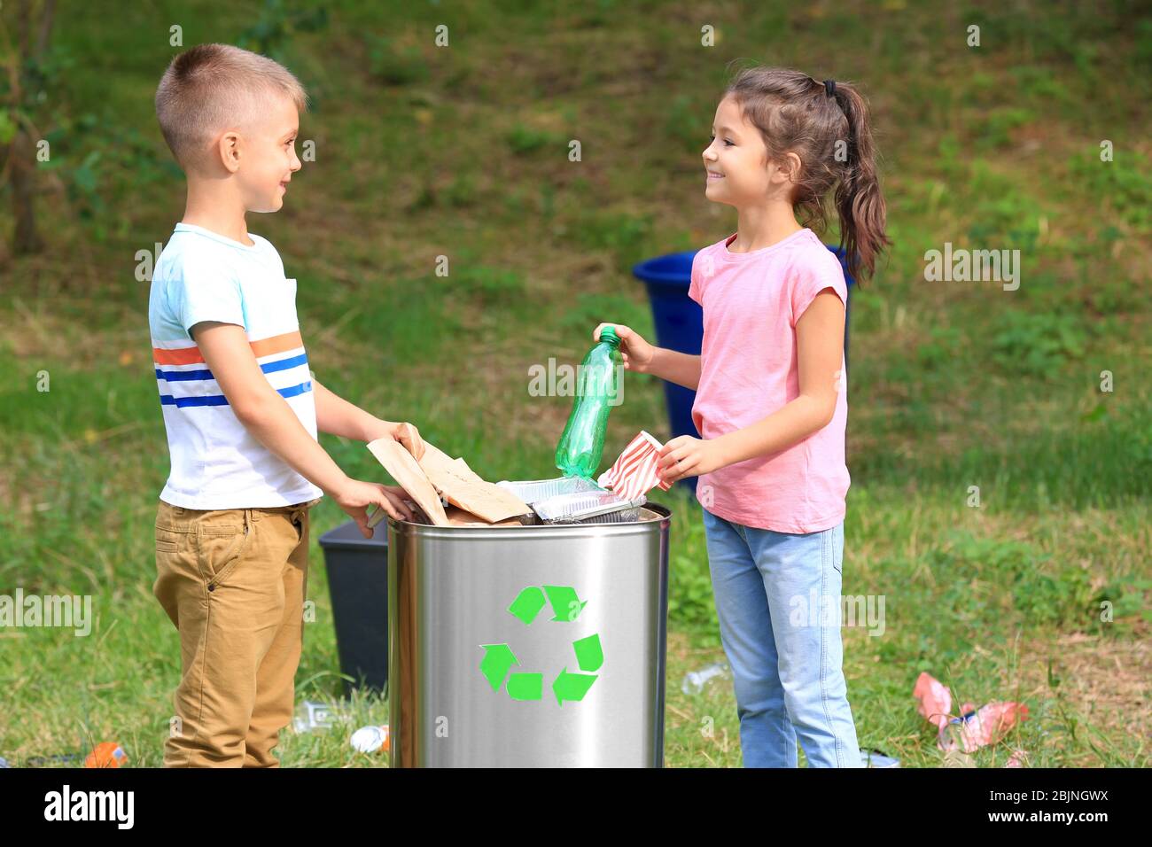 Children collecting garbage hi-res stock photography and images - Alamy
